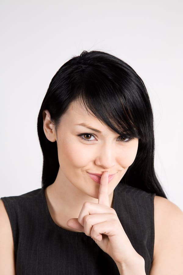 Businesswoman shushing stock image. Image of native, cheerful - 5828279