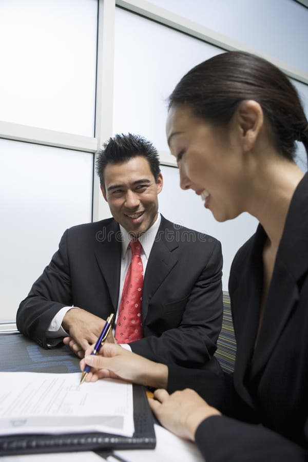 Businesswoman Signing Contract Stock Photo - Image of meeting ...