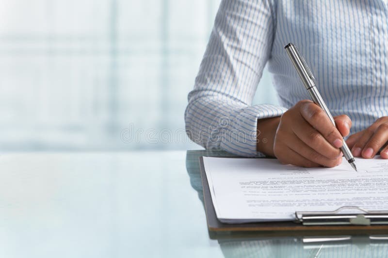 Businesswoman Signing Paper Stock Image - Image of signing, business ...