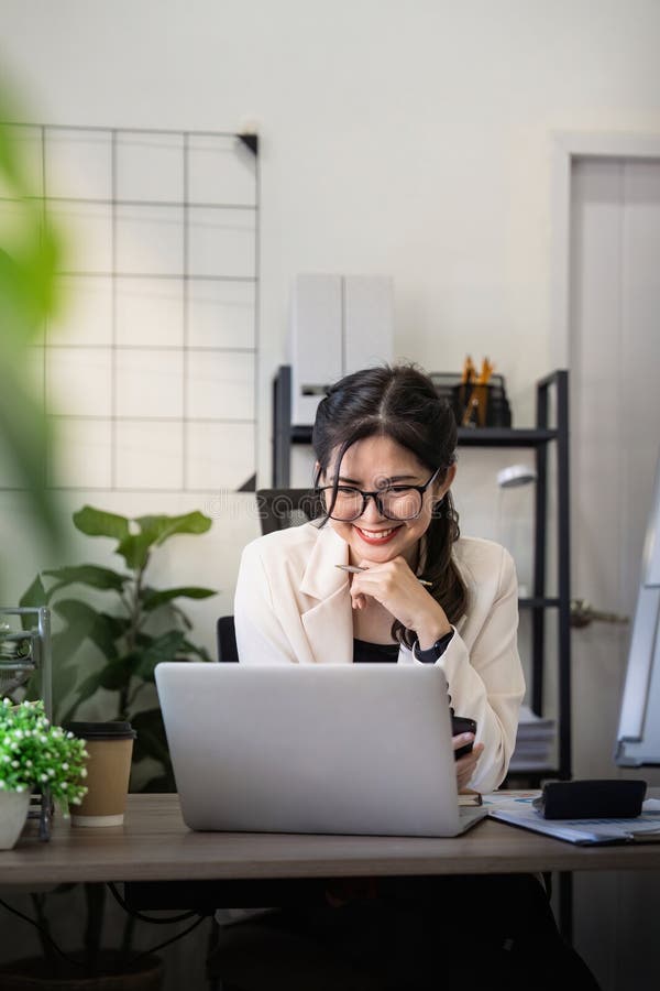 Businesswoman Smiling Confident Using Laptop Computer Working on ...