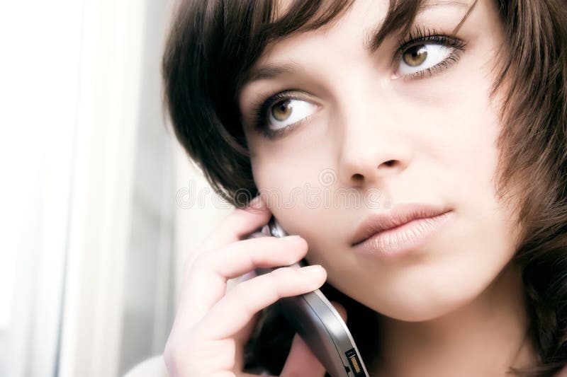 Businesswoman Speaking on Mobile Phone Stock Photo - Image of listen ...