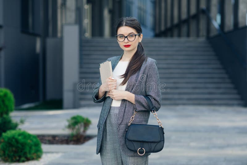Portrait Of Young Businesswoman Wearing Glasses With A Serious Face