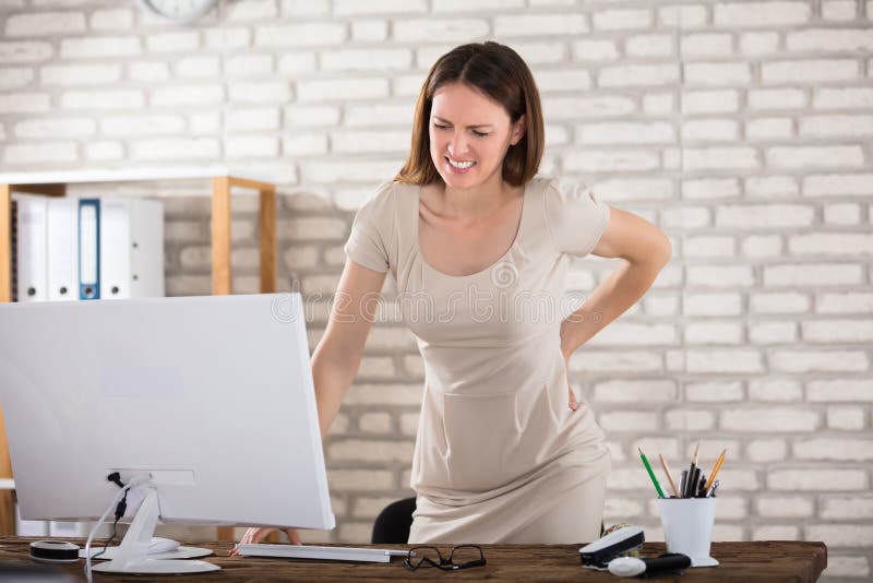 Businesswoman Suffering from Back Pain Stock Photo - Image of office ...