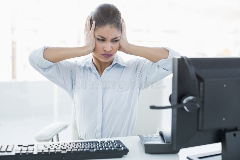 Businesswoman Suffering from Headache in Front of Computer Stock Photo ...