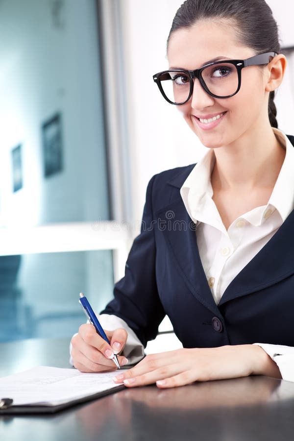 Businesswoman taking notes stock photo. Image of organize - 19523416
