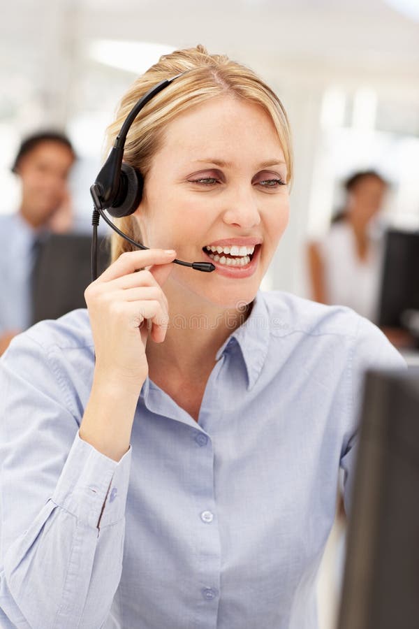 Businesswoman Talking into Headset Stock Image - Image of monitor ...