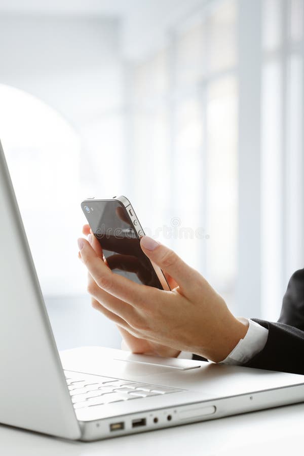 Businesswoman texting stock photo. Image of internet - 30990508