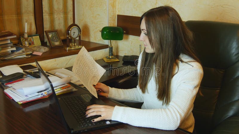 Businesswoman Typing Document on Laptop at Office Stock Image - Image ...