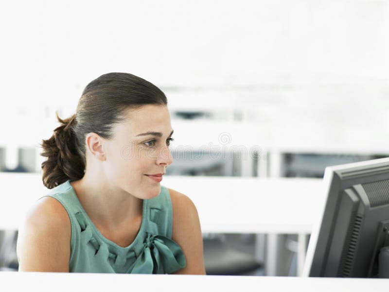 Businesswoman Using Computer in Office Stock Image - Image of adult ...