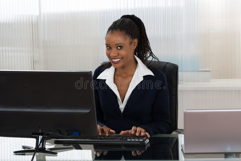 Businesswoman Using Computer Stock Image - Image of indoors ...