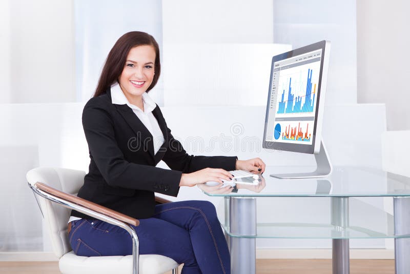 Businesswoman Using Computer Stock Photo - Image of graph, chart: 39829384
