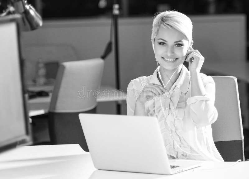 Businesswoman Using Headset at Work Stock Photo - Image of headset ...
