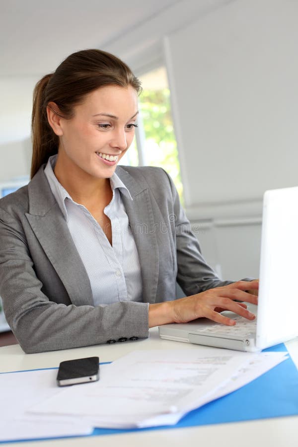 Senior Businesswoman Using Laptop Stock Image - Image of casual, desk ...