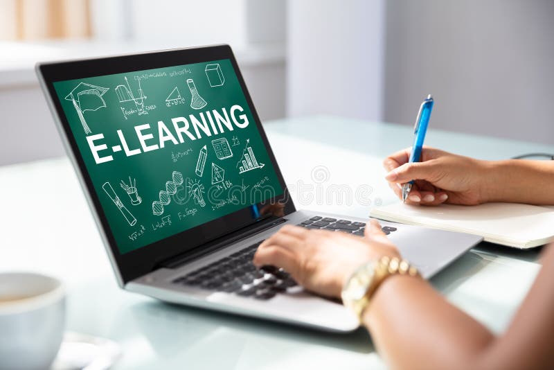 Businesswoman Using Laptop with E-learning Concept on Screen Stock ...