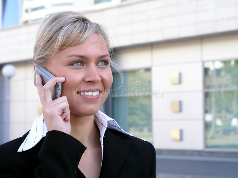 Businesswoman Using a Mobile Phone Stock Photo - Image of corporate ...