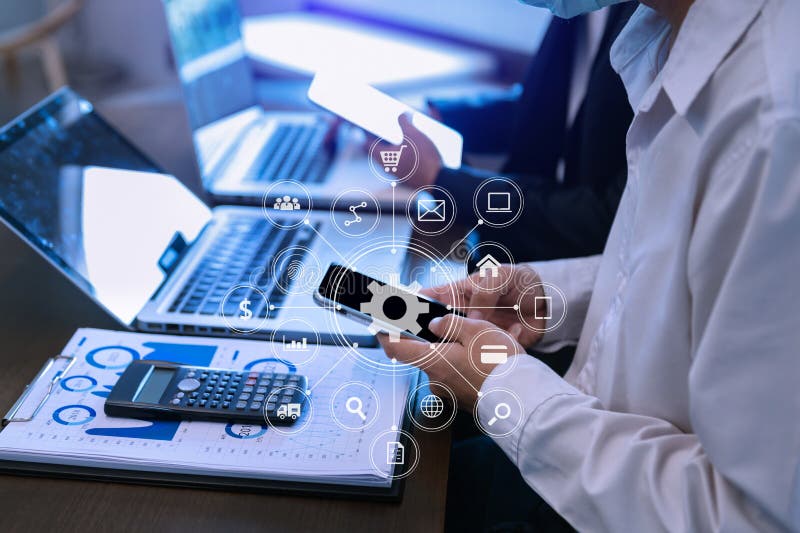 Businesswoman Using Mobile Phone and Laptop Computer on White Desk Big ...