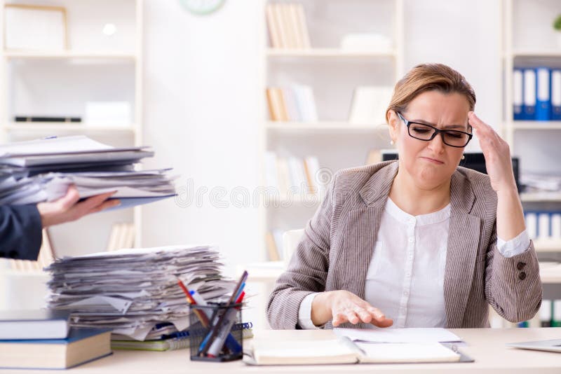 The Businesswoman Very Busy with Ongoing Paperwork Stock Image - Image ...