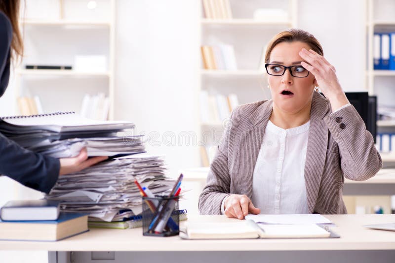 The Businesswoman Very Busy with Ongoing Paperwork Stock Photo - Image ...