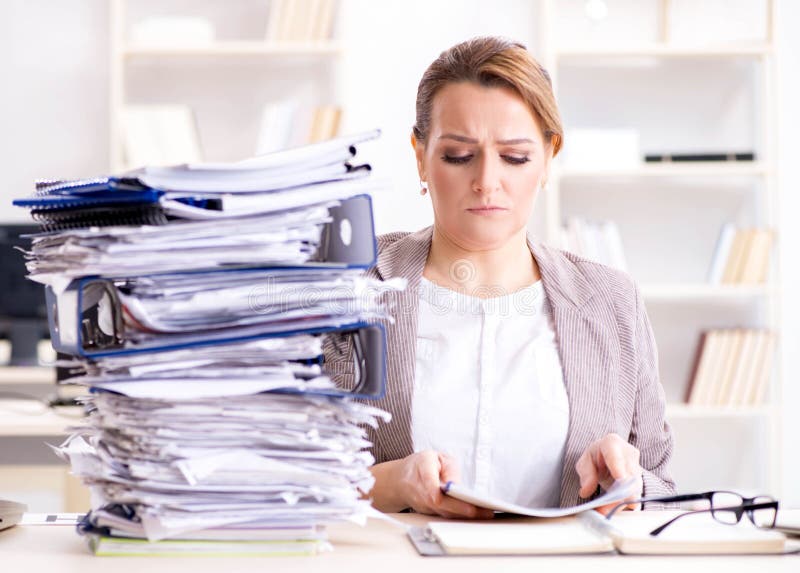 Businesswoman Very Busy with Ongoing Paperwork Stock Photo - Image of ...