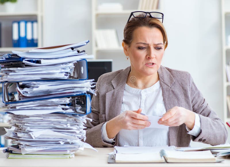 Businesswoman Very Busy with Ongoing Paperwork Stock Photo - Image of ...