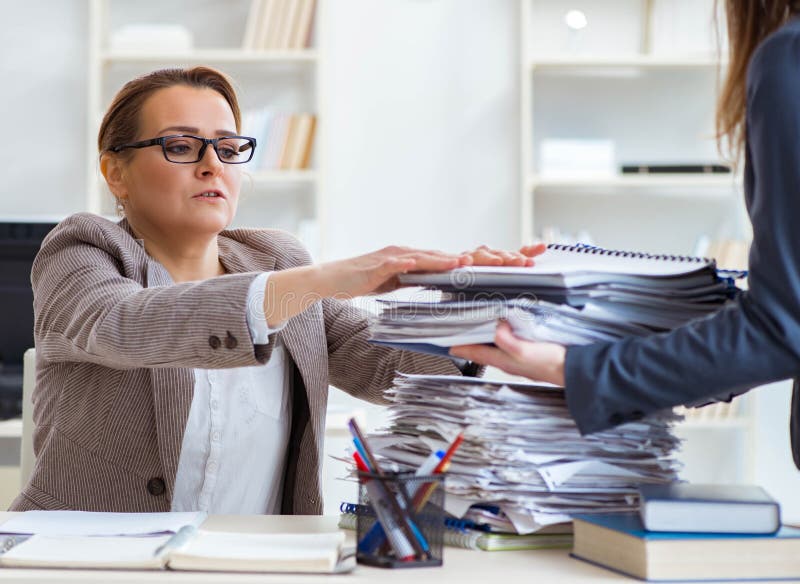Businesswoman Very Busy with Ongoing Paperwork Stock Image - Image of ...