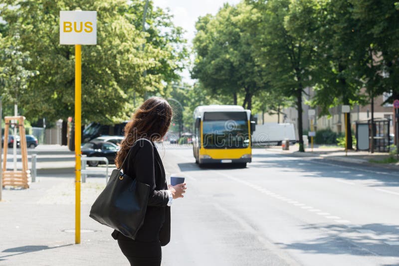 Businesswoman Waiting for Bus Stock Photo - Image of information ...