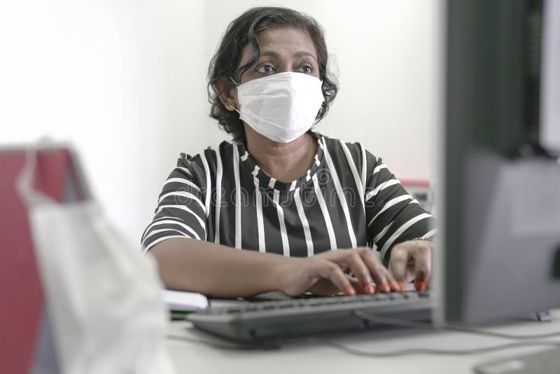 Businesswoman Wearing Face Mask Typing on Keyboard Stock Image - Image ...