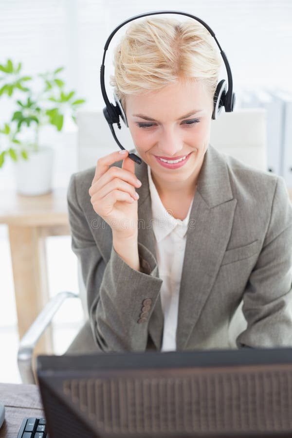 Businesswoman Wearing a Headset Stock Photo - Image of happy ...