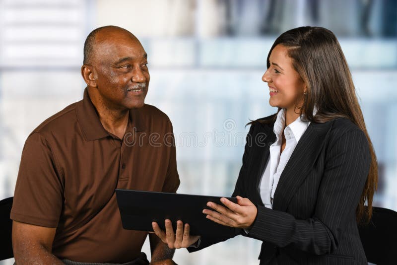 Businesswoman at Work with Senior Client Stock Image - Image of advisor ...