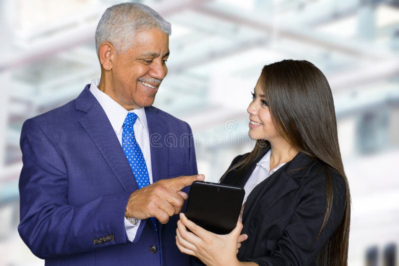 Businesswoman at Work with Senior Client Stock Photo - Image of senior ...