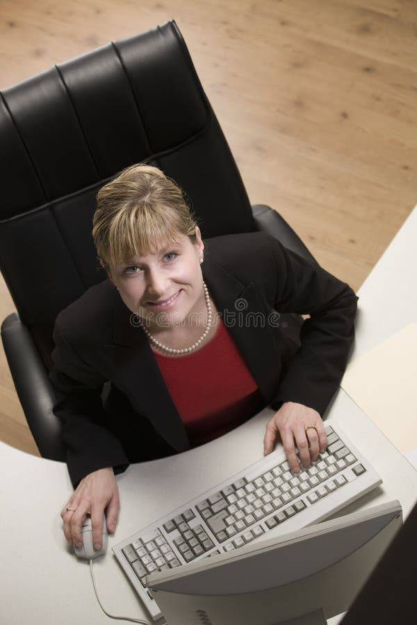 Businesswoman Working at Computer Stock Photo - Image of computer ...