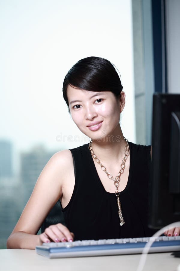 Businesswoman Working with Computer in Office Stock Photo - Image of ...