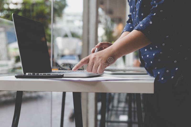 Businesswoman Working with Document and Computer in Office Workplace ...