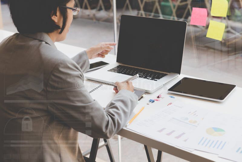 Businesswoman Working with Document and Computer in Office Workplace ...