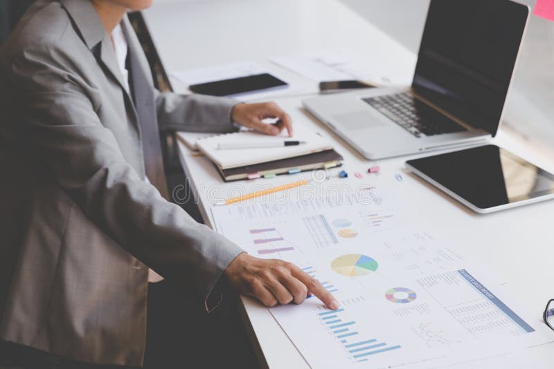 Businesswoman Working with Document and Computer in Office Workplace ...
