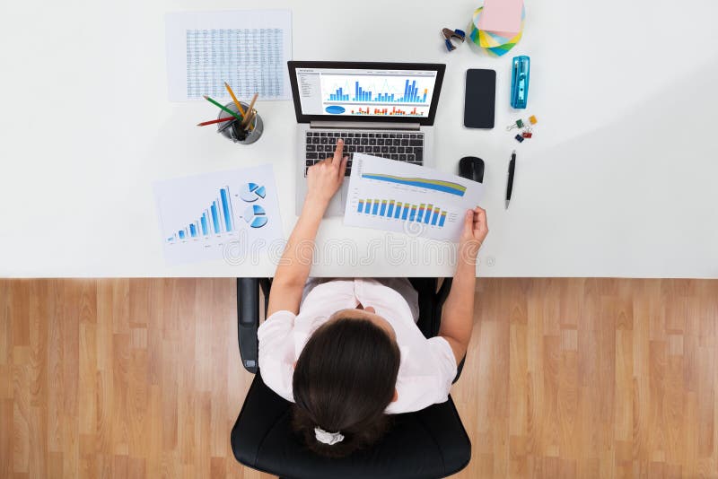 Businesswoman Working with Graphs Stock Photo - Image of office ...