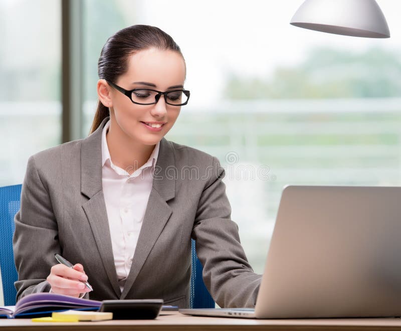 Businesswoman Working at Her Desk Stock Image - Image of employer ...