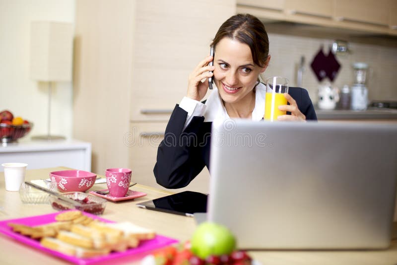 Businesswoman Working at Home during Breakfast Stock Photo - Image of ...
