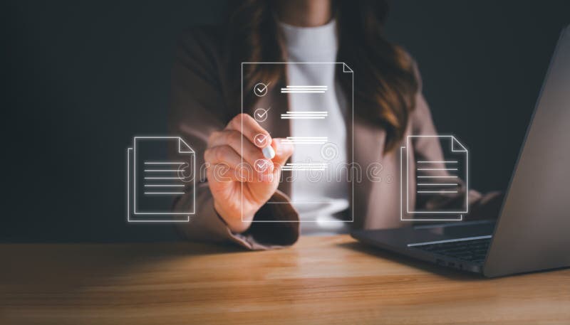 Businesswoman Working on Laptop with Electronics Document Icons by ...