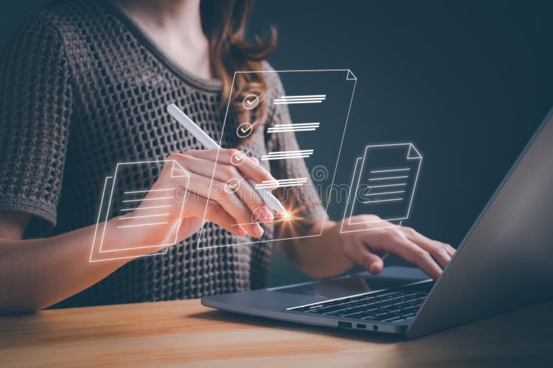Businesswoman Working on Laptop with Electronics Document Icons by ...