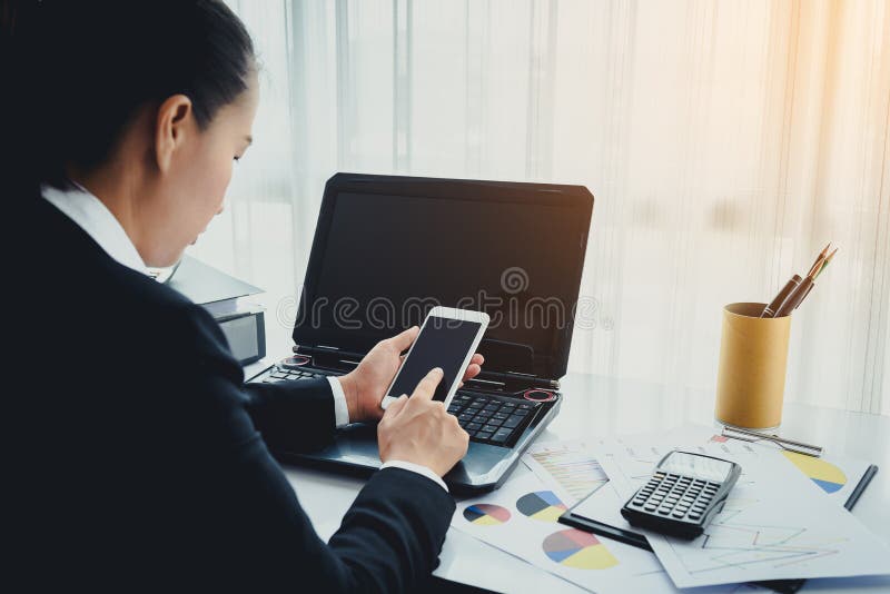 Businesswoman Working with Modern Devices, Labtop Computer and M Stock ...