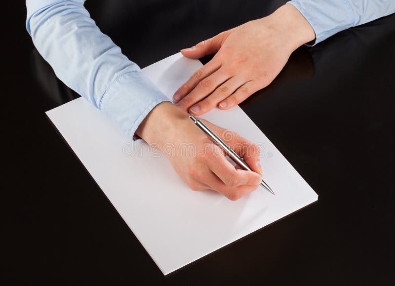 Businesswoman Writing Down Notes on the Paper (signing a Document ...