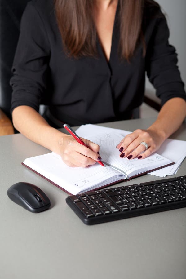 Businesswoman writing stock image. Image of elegant, ballpoint - 35705431