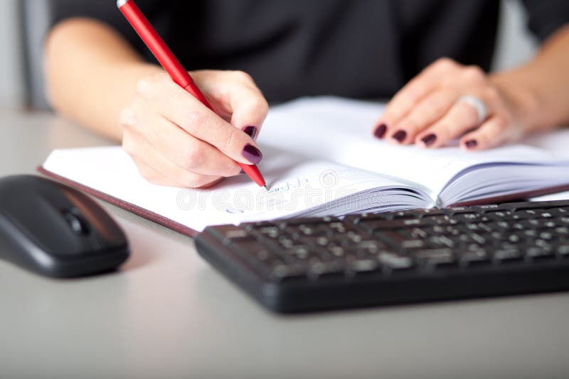 Businesswoman writing stock image. Image of ballpoint - 35705697