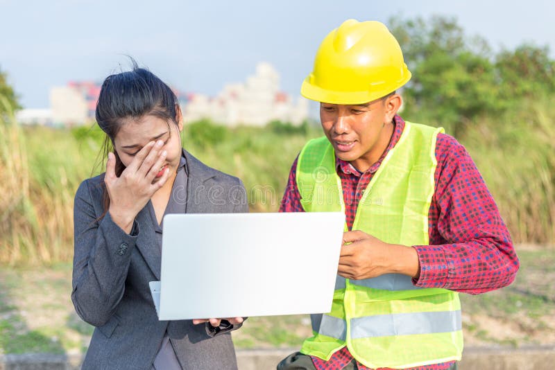 Businesswomen and Foreman Talking Together and Happy Funny. Engineer ...