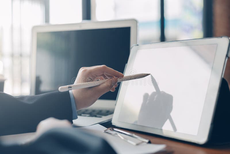 Businesswomen Hand Use Pen for Point on Tablet. People Working on ...