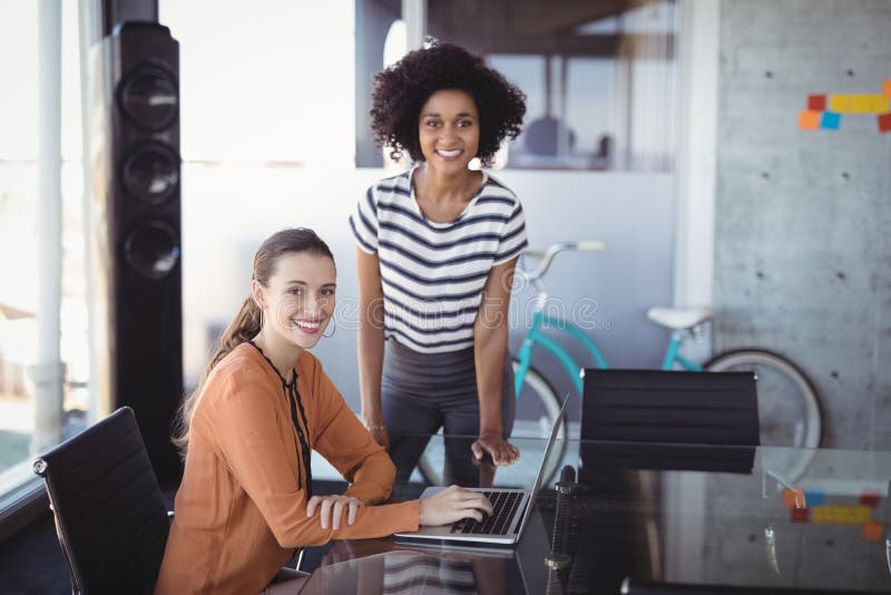 Two Creative Women Working Together in Office Stock Photo - Image of ...