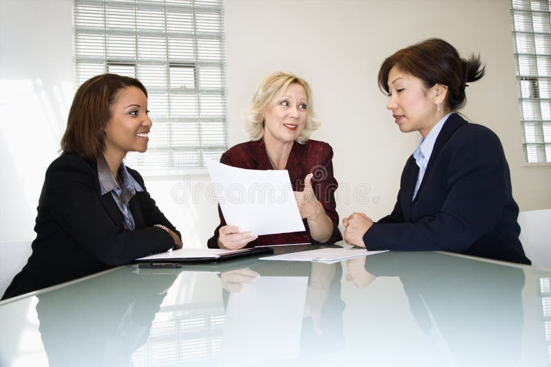 Three Businesswomen at Desk Stock Photo - Image of asian, meeting: 5621036