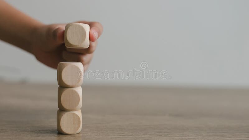 Businesswomen Stack Blank Wooden Cubes on the Table with Copy Space ...