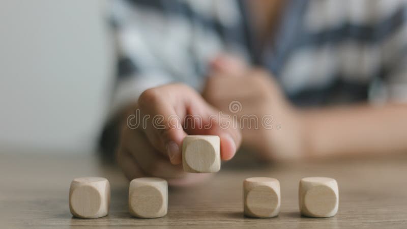 Businesswomen Stack Blank Wooden Cubes on the Table with Copy Space ...